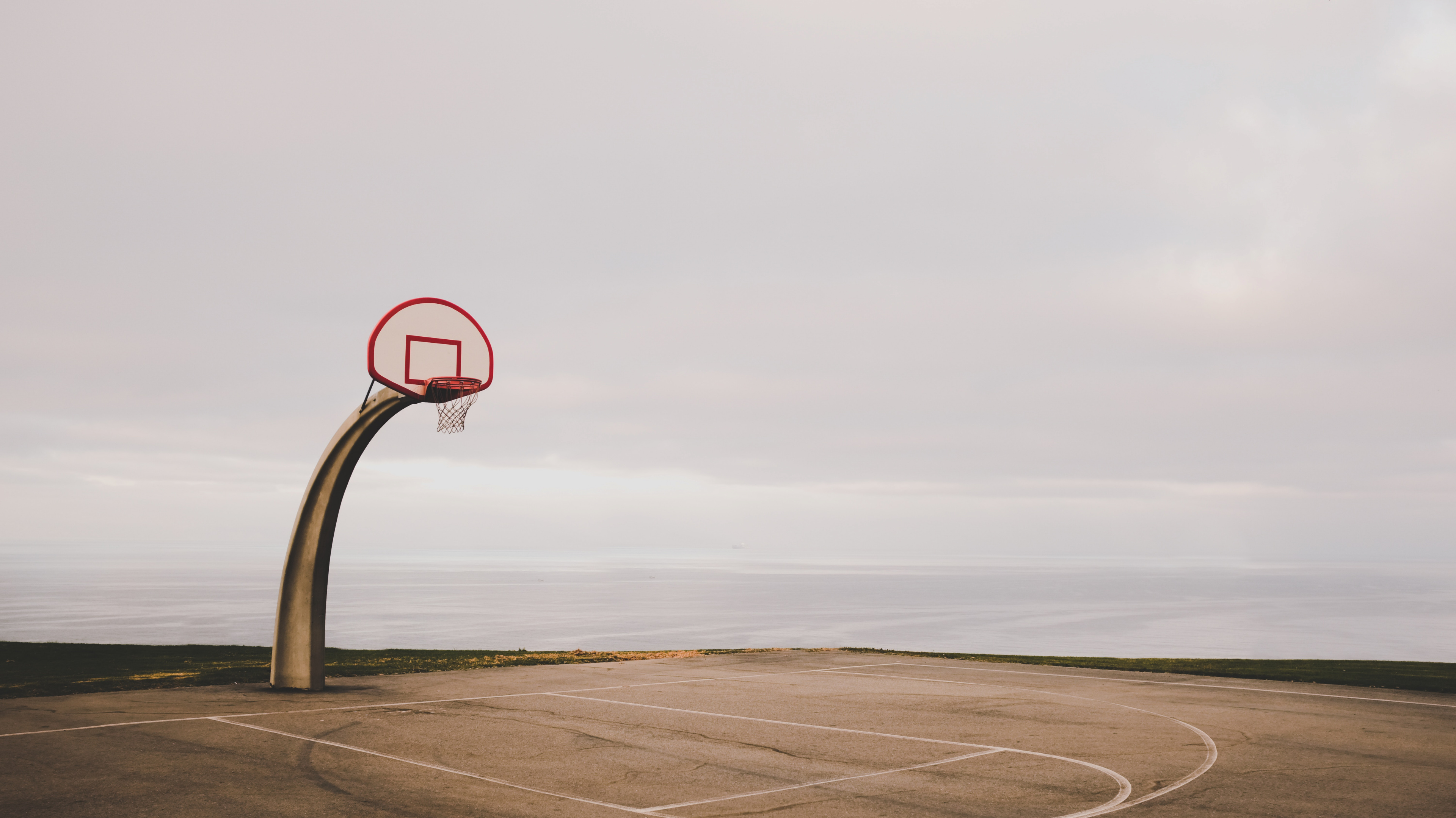 Wallpaper Basketball Hoop on Brown Sand Under White Sky During Daytime ...