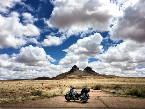 Wallpaper Black Motorcycle on Brown Field Under White Clouds and Blue ...